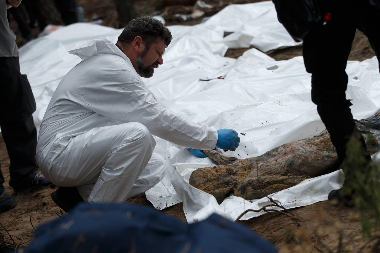 Most bodies exhumed in Ukraine's deoccupied Izium show signs of violent ...