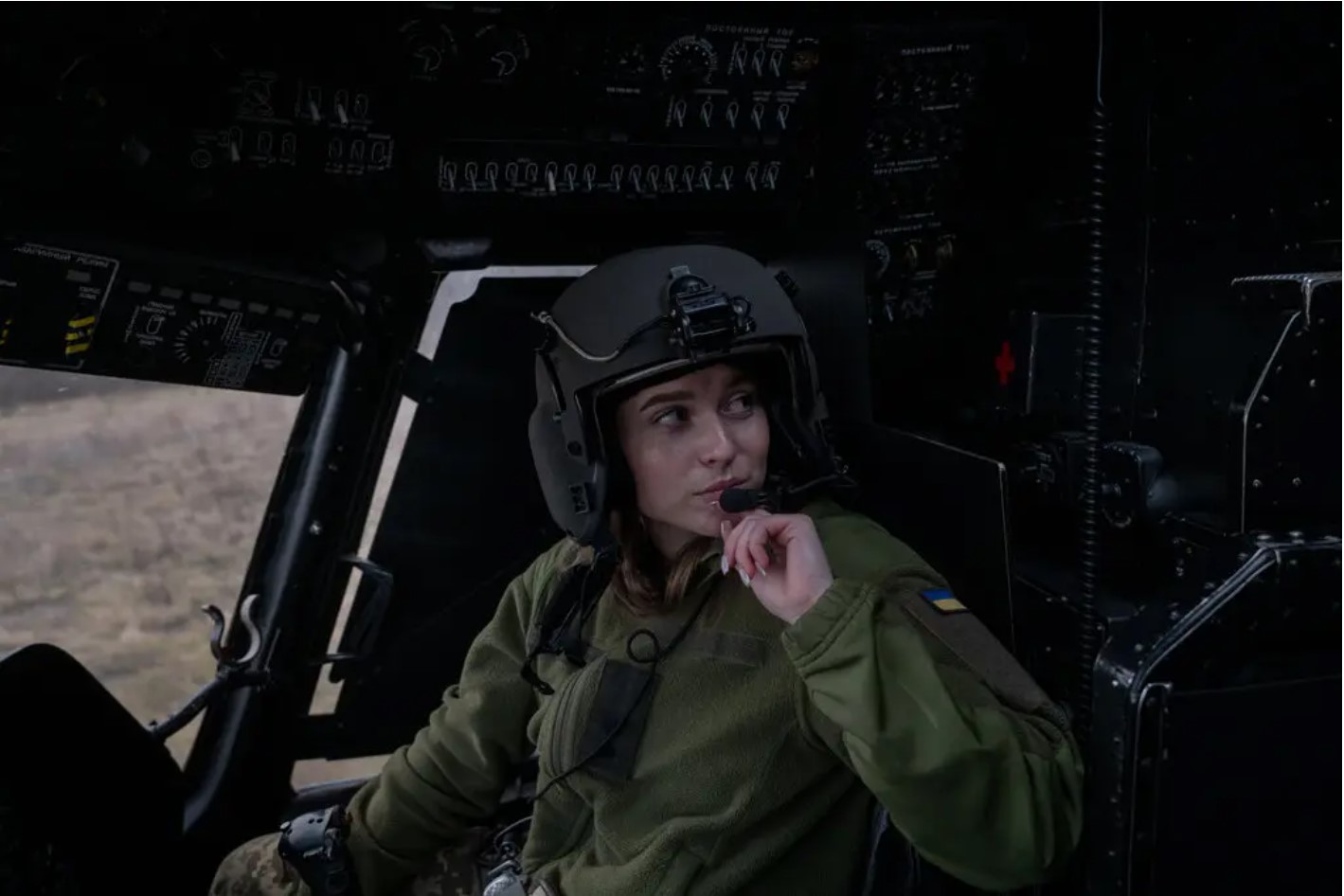 Katya is Ukraine’s only female helicopter pilot. Her blond hair, she ...